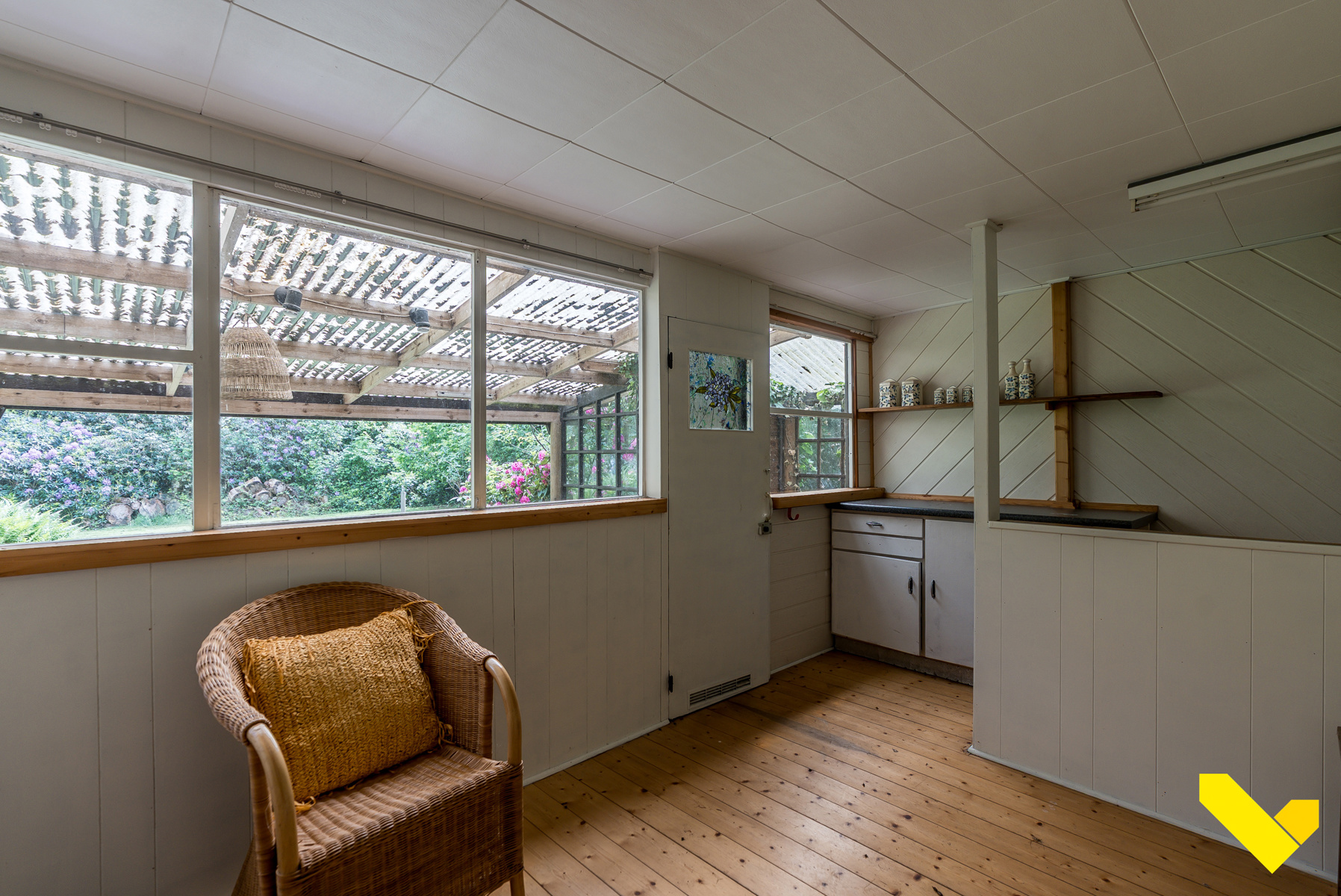 IMMO VL | Charmante chalet met garage en carport op ruim perceel